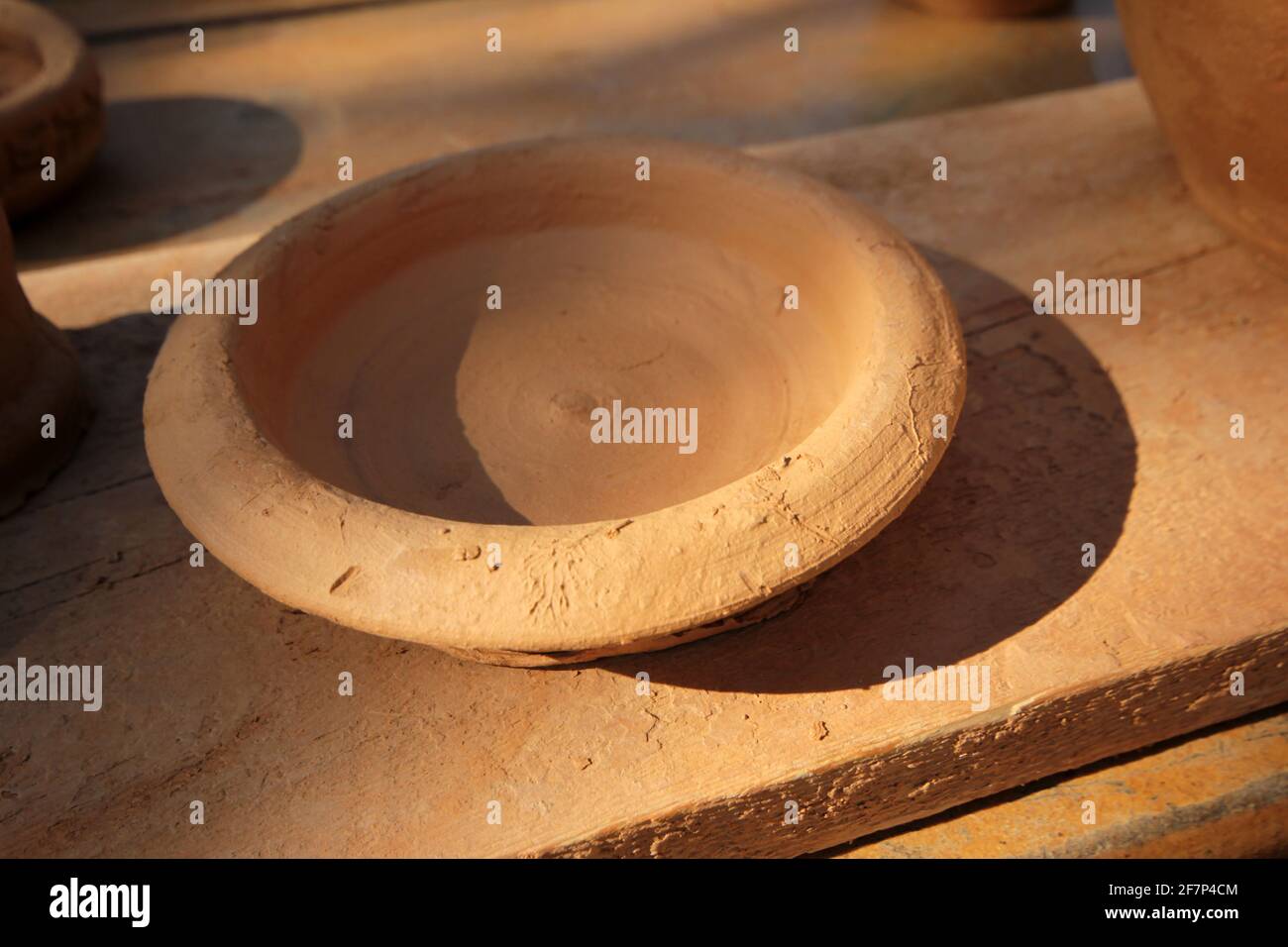 Handmade earthenware utensils. Empty clay pot background texture Stock ...