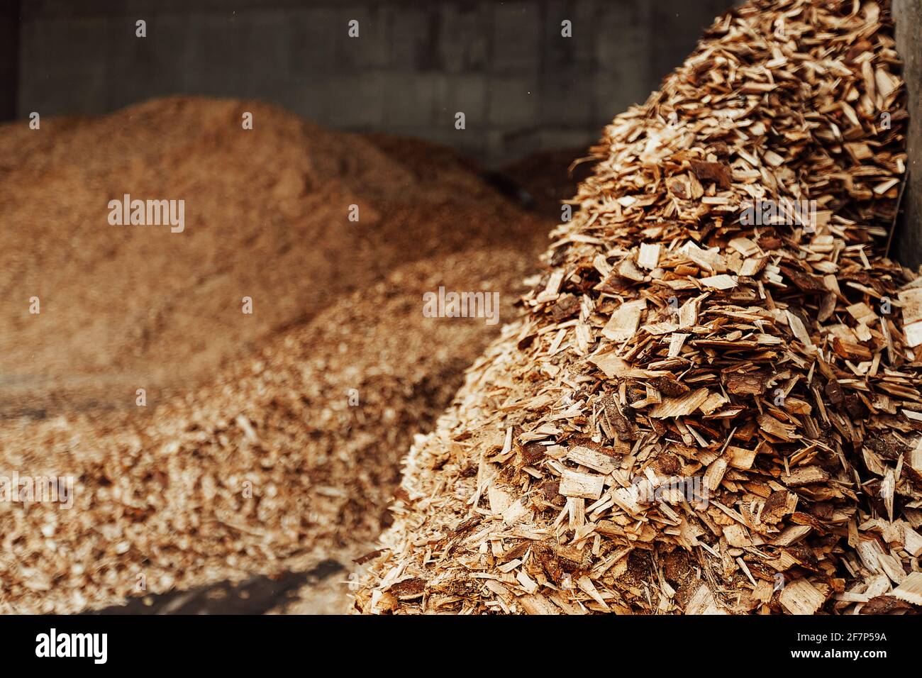 the truck unloads tons of wood waste. sawdust and shavings are stored ...