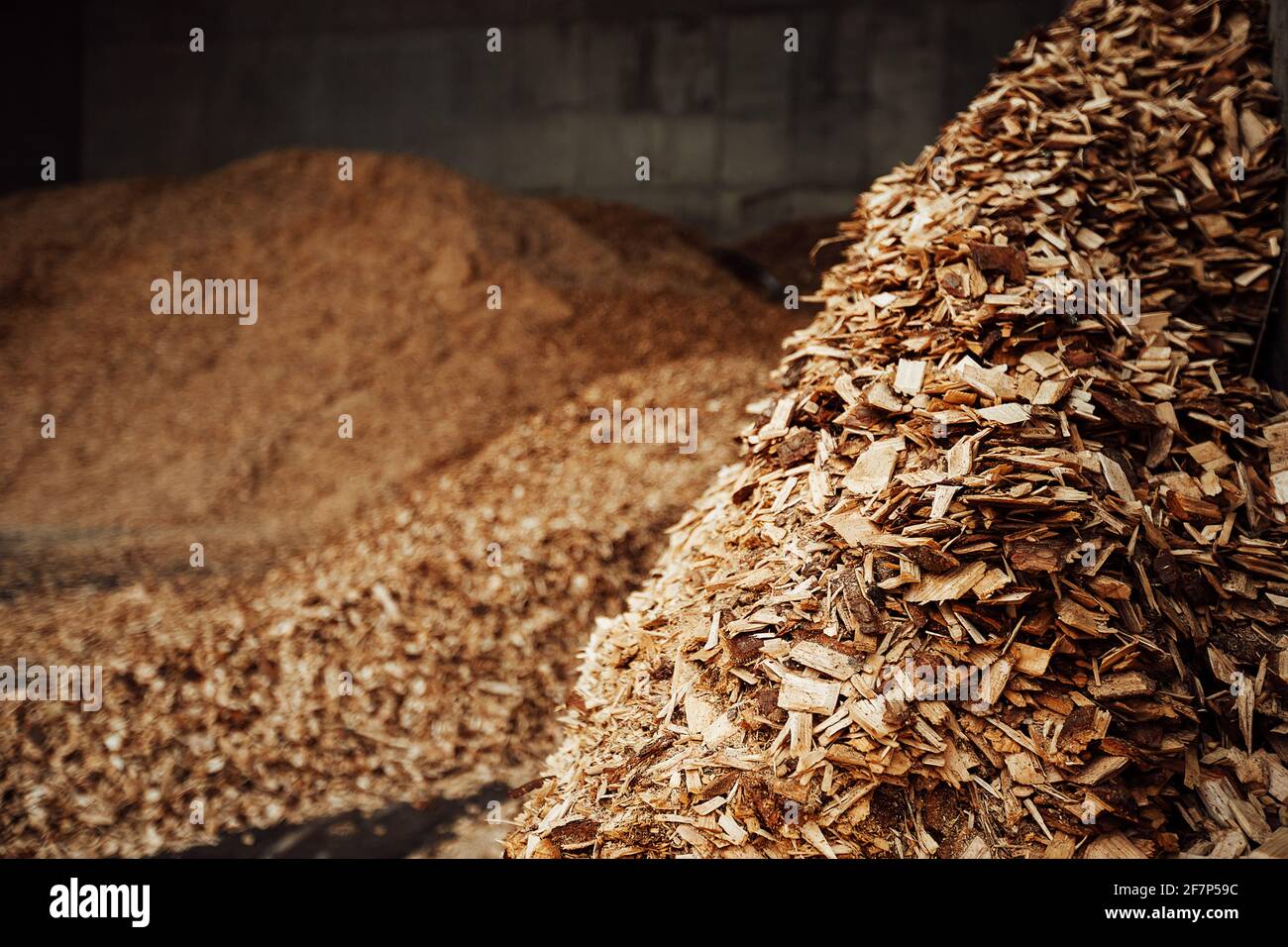 the truck unloads tons of wood waste. sawdust and shavings are stored ...