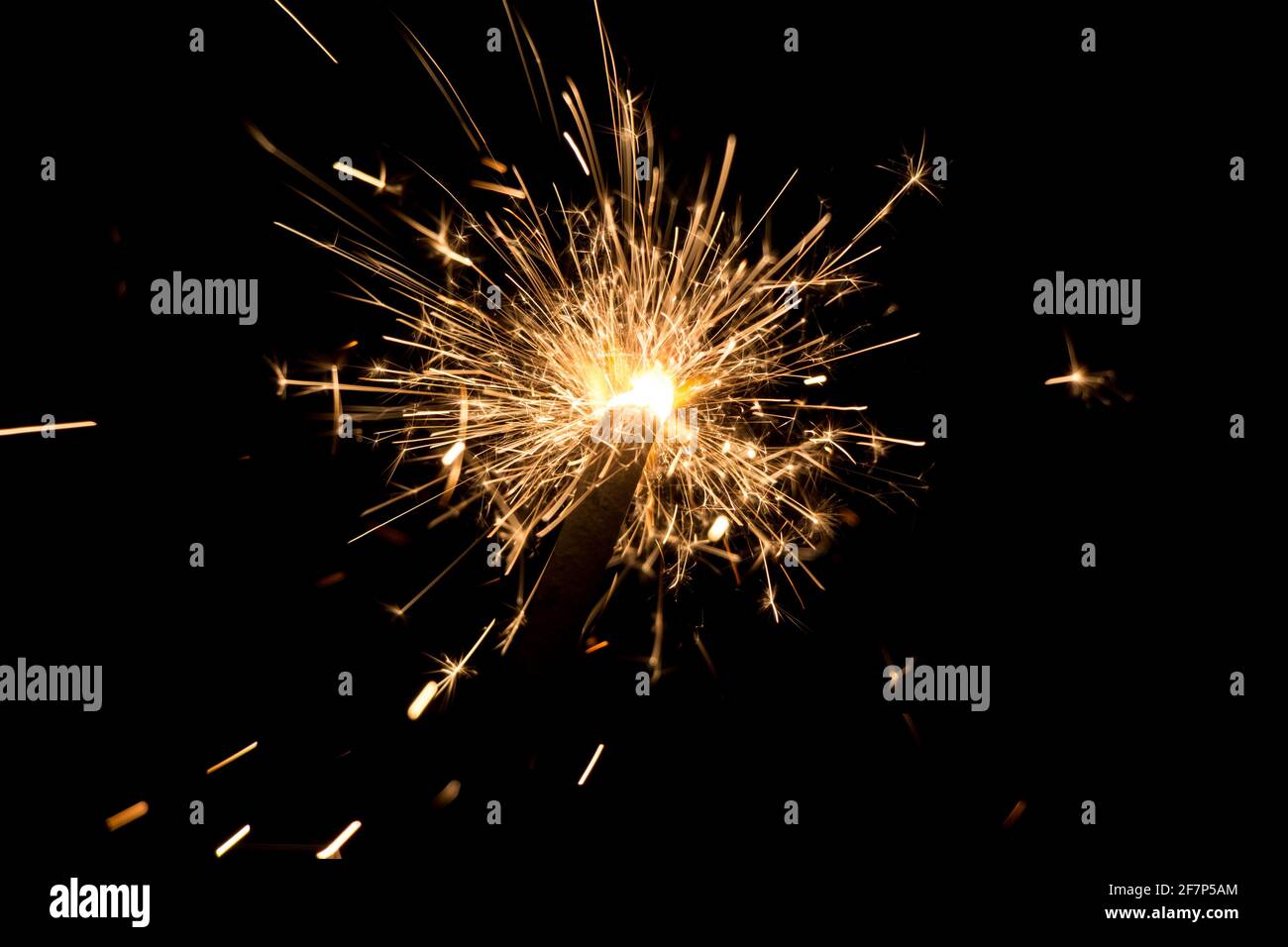 Orange sparkler countdown with spread of golden glitter sparks. Luxury ...