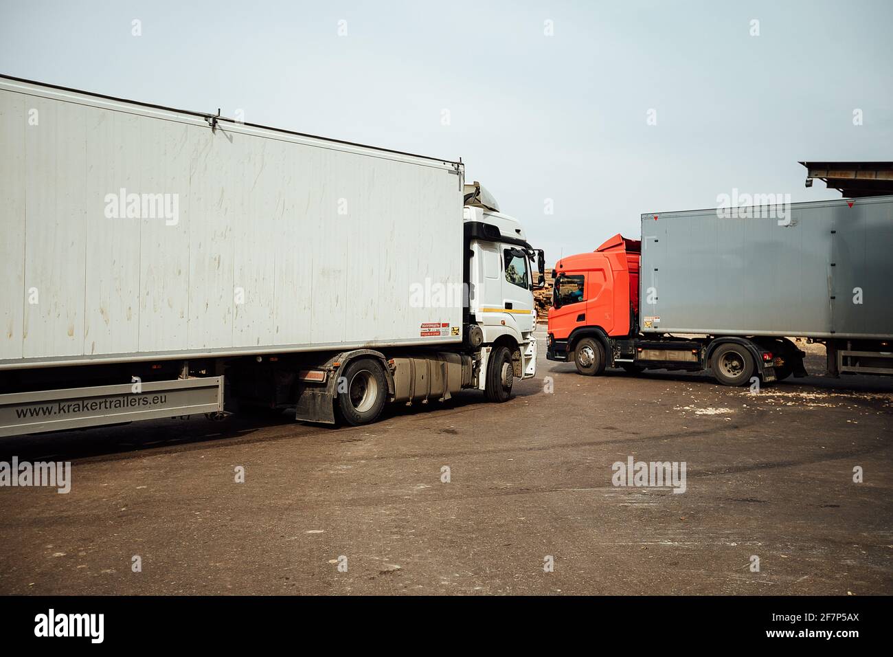 the truck unloads tons of wood waste. sawdust and shavings are stored ...