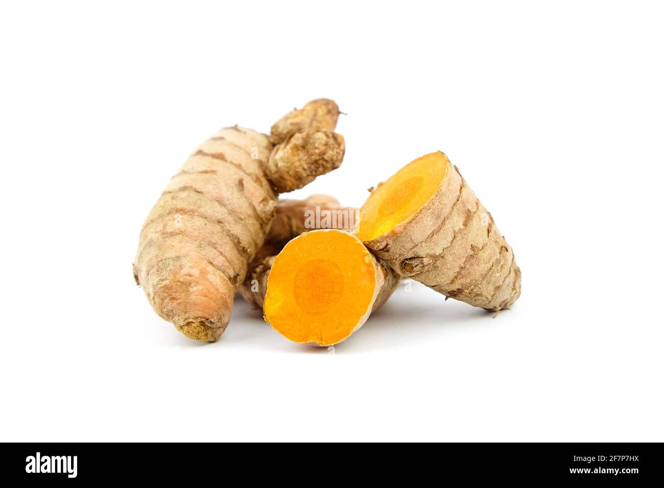 Turmeric roots isolated on white background. Halves curcuma rhizome ...