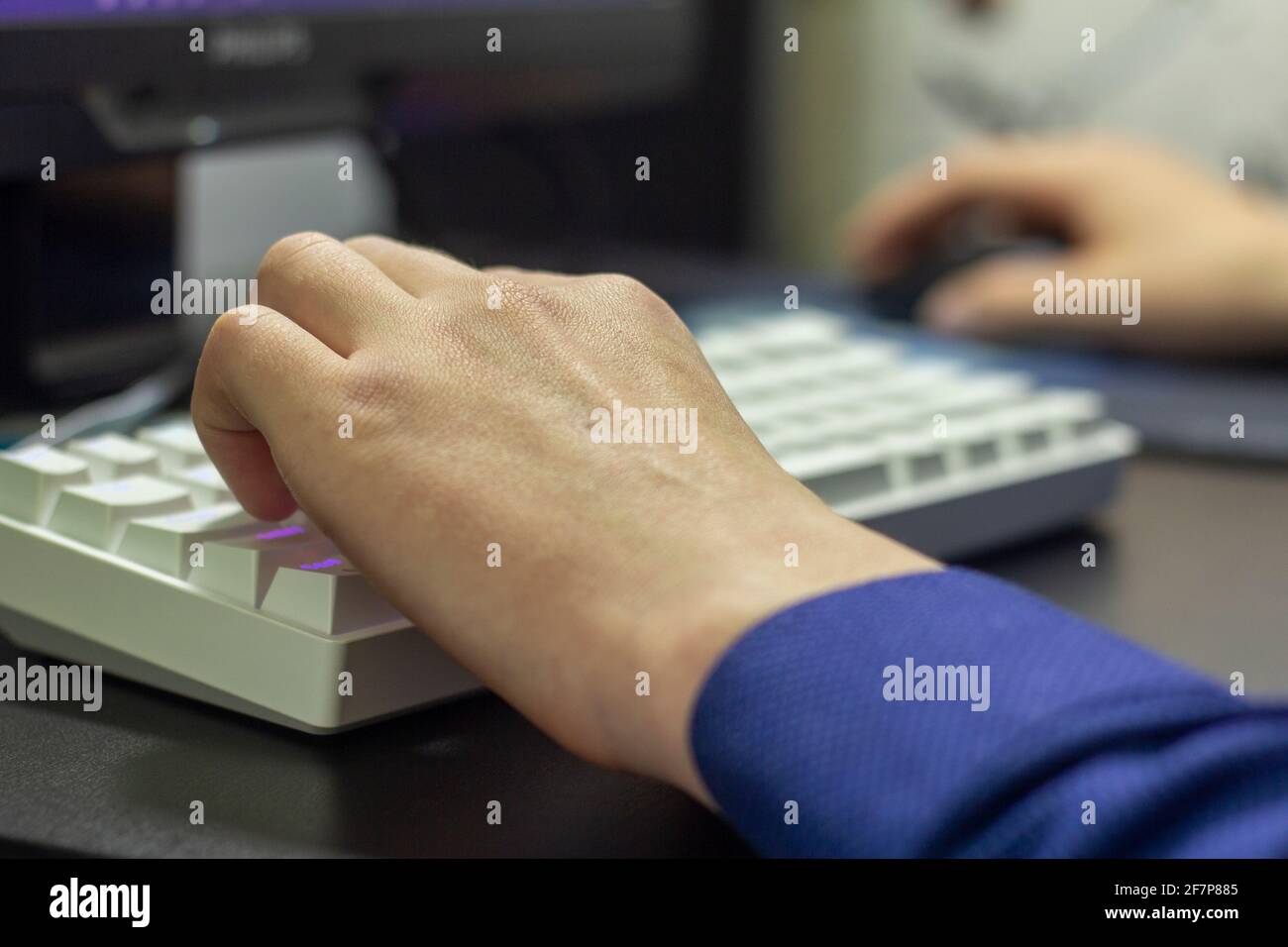 Hands on keyboard backlit hi-res stock photography and images - Alamy