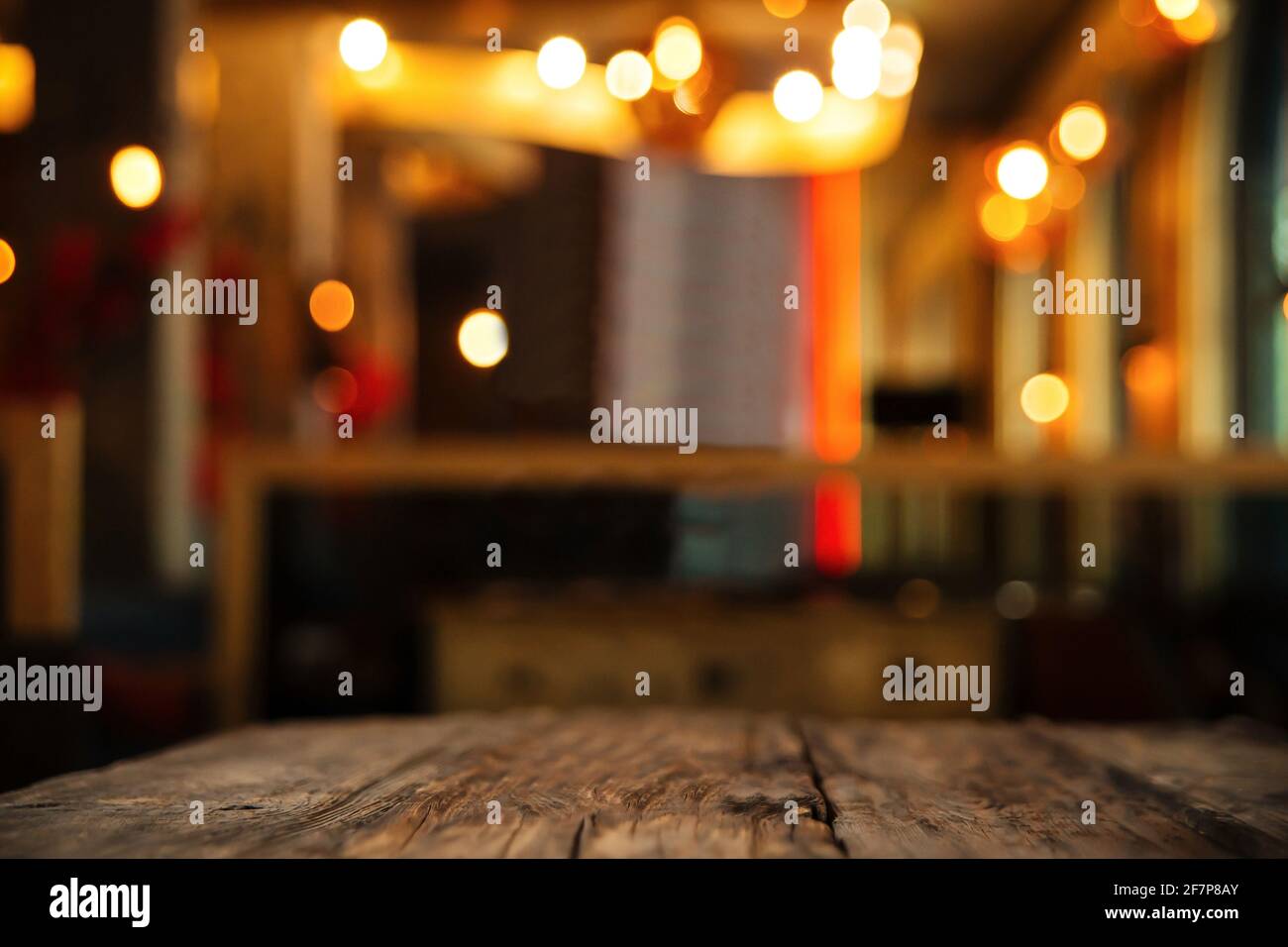 Bar table with a blurry background for copy space Stock Photo - Alamy