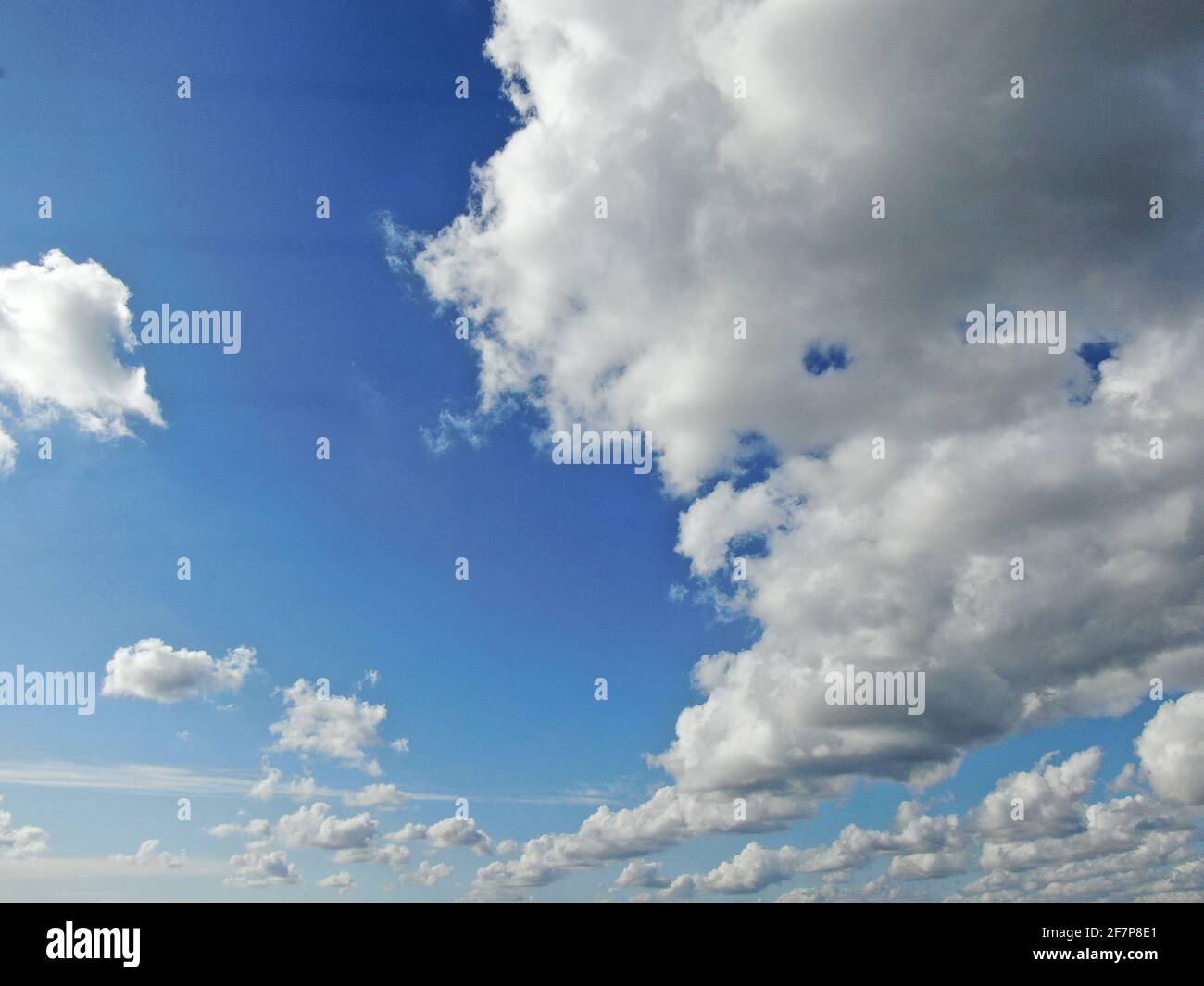 beautiful and dramatic white fluffy clouds in a deep blue sky Stock ...
