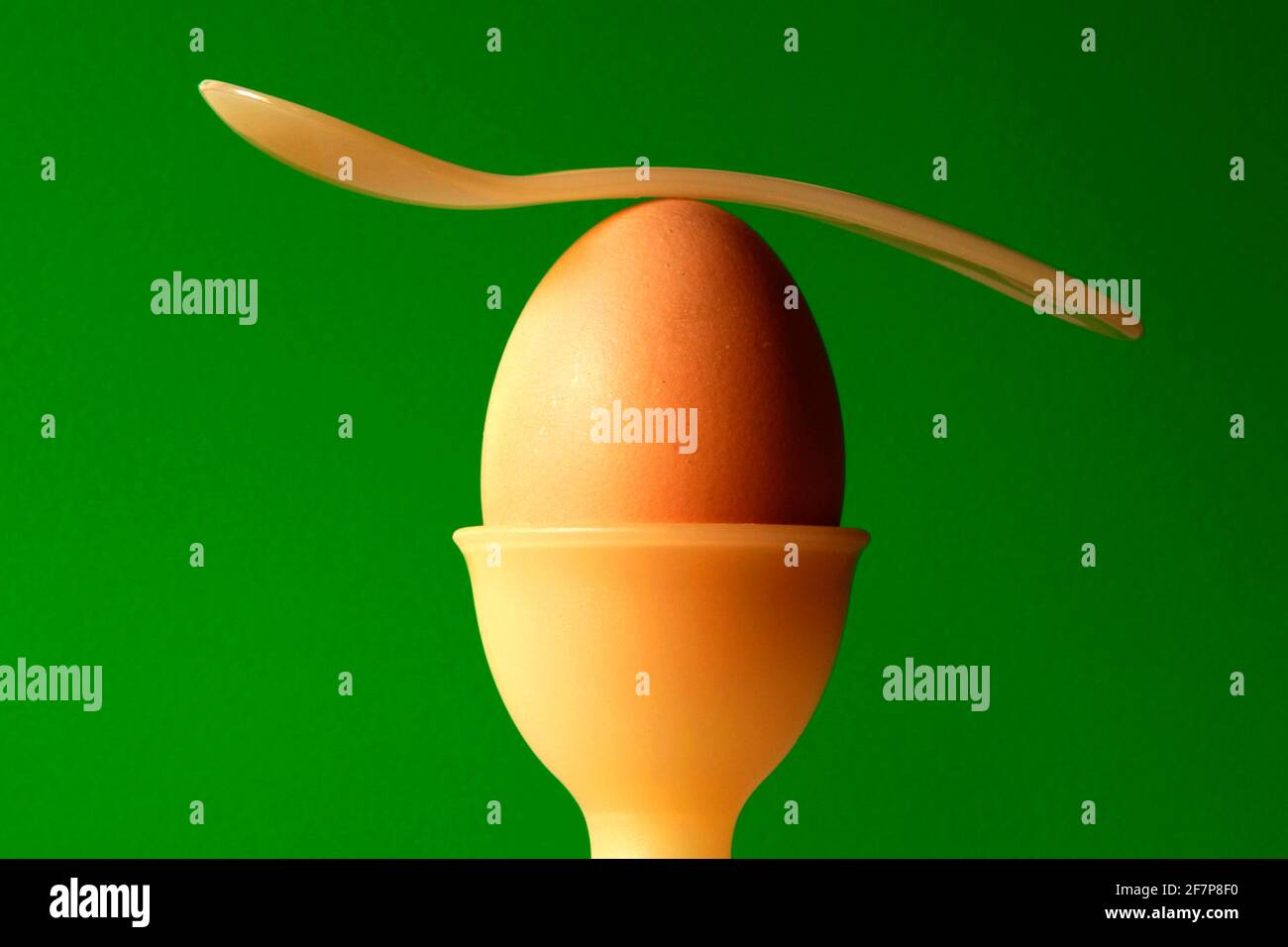 Spoon in egg hi-res stock photography and images - Alamy