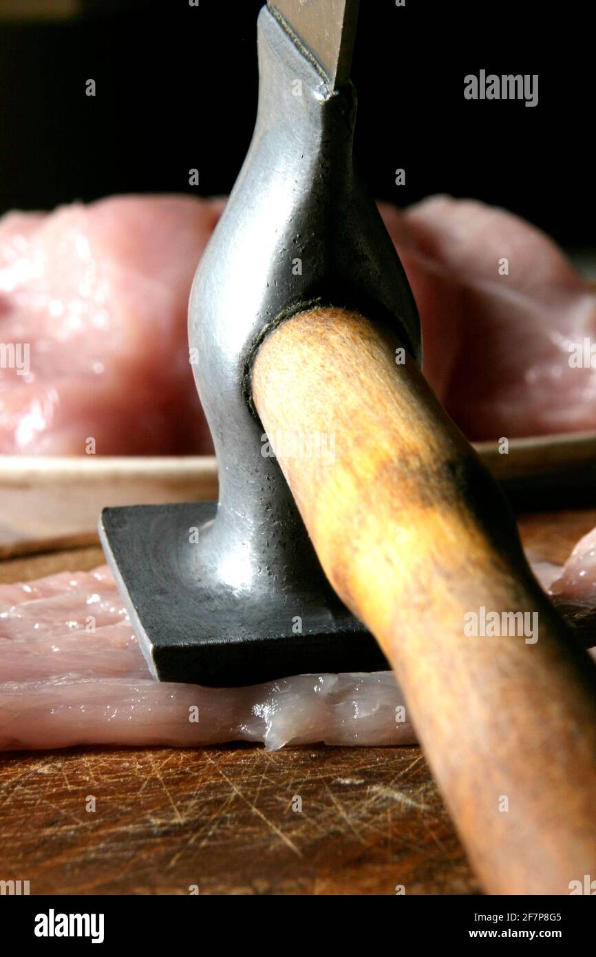 preperation of poultry meat, meat hammer Stock Photo - Alamy
