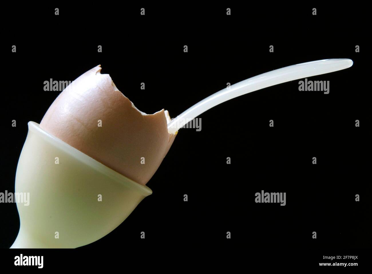 boiled breakfast egg with an egg spoon in an egg cup Stock Photo - Alamy