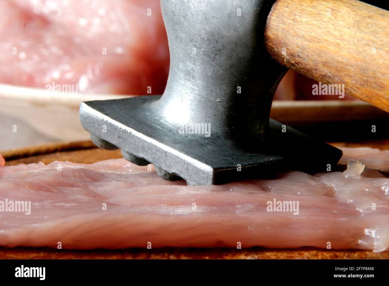 preperation of poultry meat, meat hammer Stock Photo - Alamy