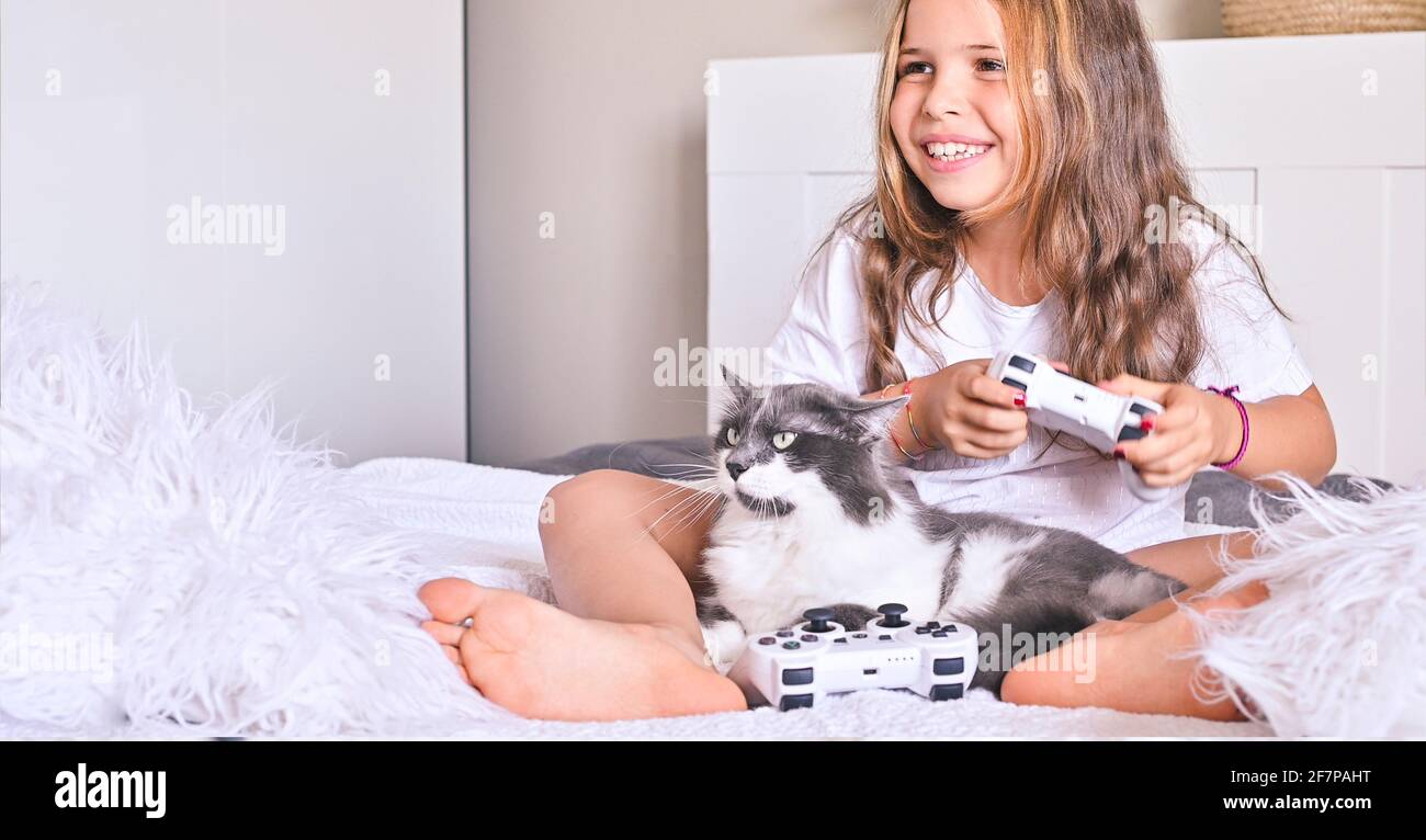 Child playing computer games. High quality photoA child plays computer ...