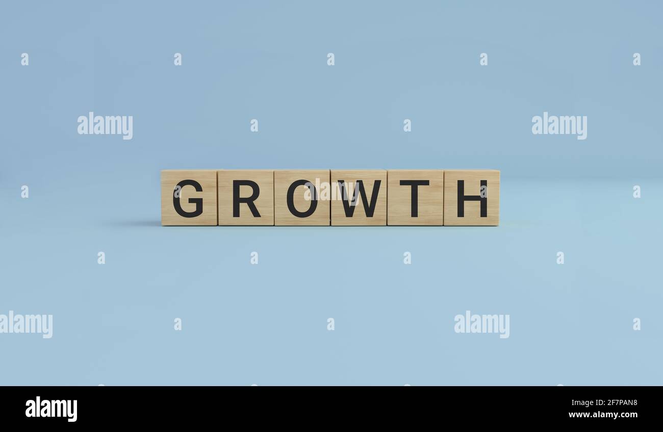 GROWTH word made with wooden cube blocks. business concept Stock Photo ...