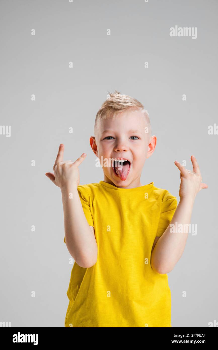 Happy boy isolated on white studio background. Looks happy, cheerful ...