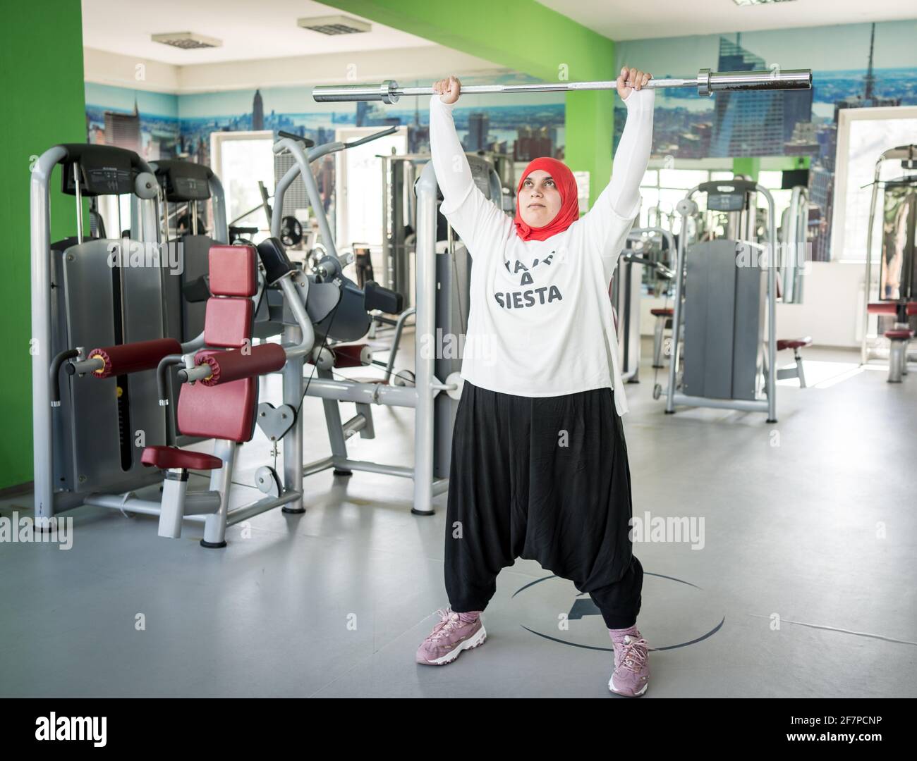 Arabic woman active working out in big gym Stock Photo - Alamy