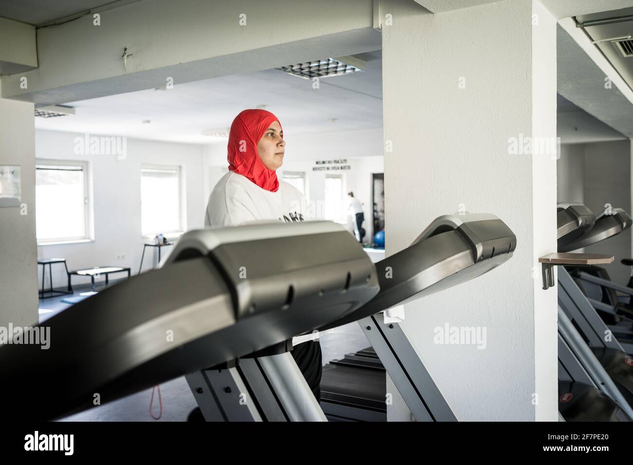 Arabic woman active working out in big gym Stock Photo - Alamy