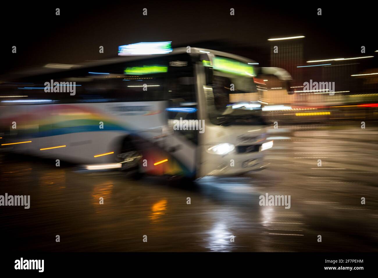 City public transport at beautiful dark night Stock Photo - Alamy