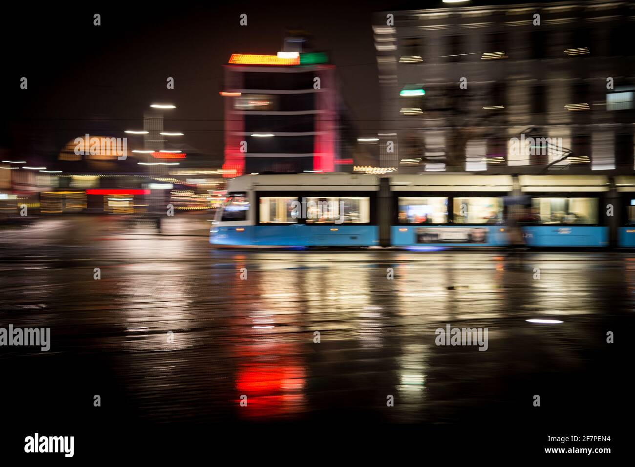 City public transport at beautiful dark night Stock Photo - Alamy