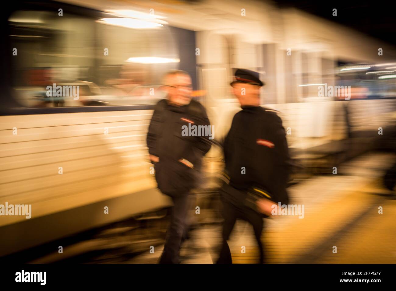 Train coming at downtown station in a motion Stock Photo - Alamy