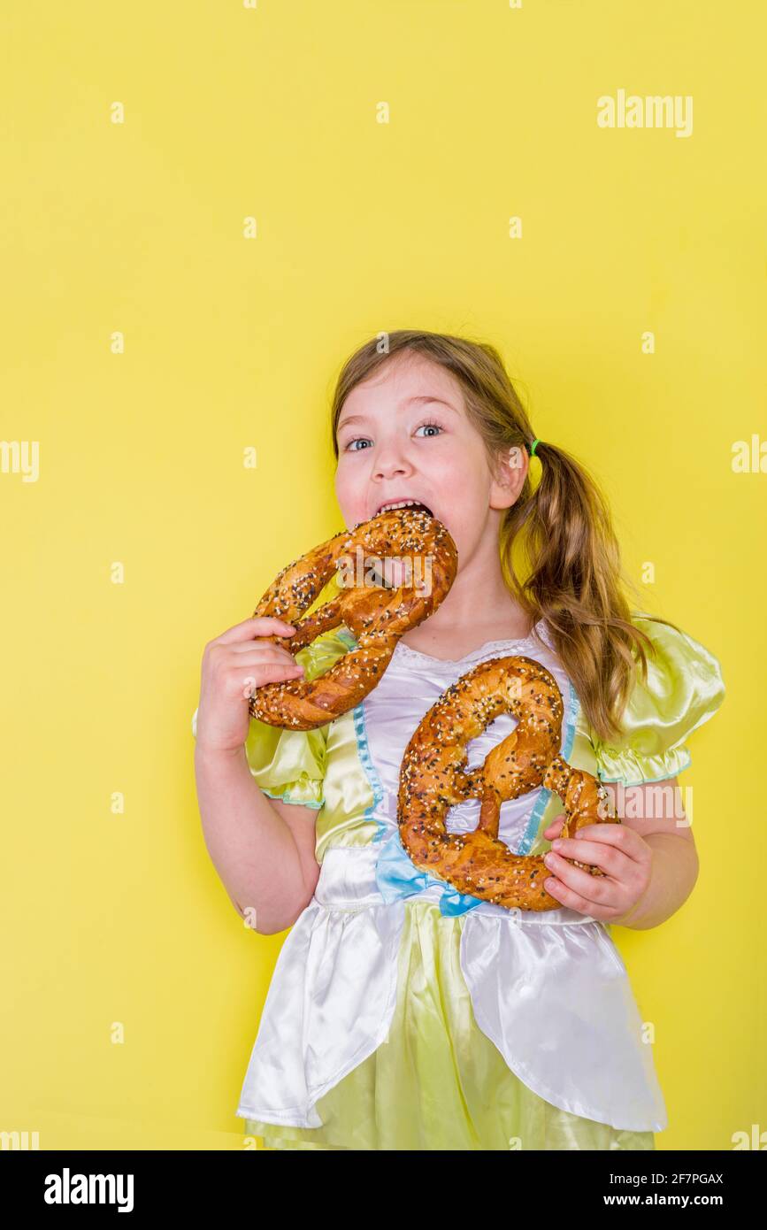 German Bavarian Oktoberfest holiday concept. Funny smile cute little ...