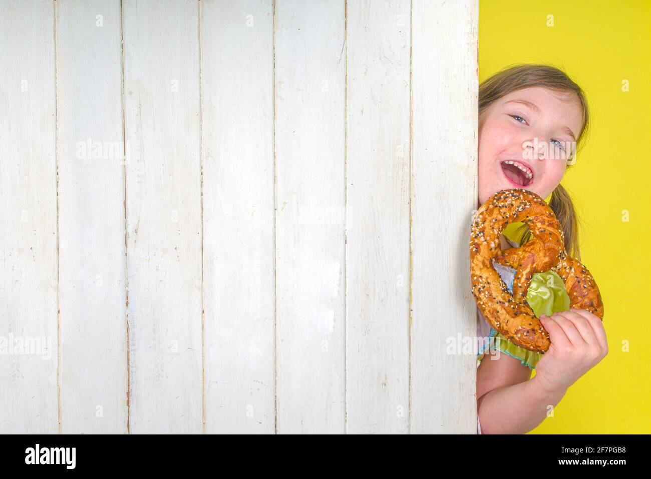 German Bavarian Oktoberfest holiday concept. Funny smile cute little ...