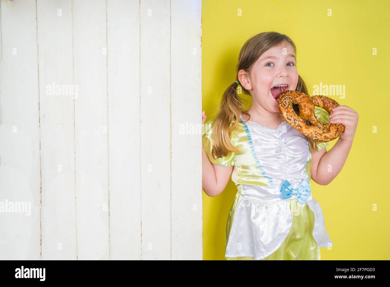 German Bavarian Oktoberfest holiday concept. Funny smile cute little ...