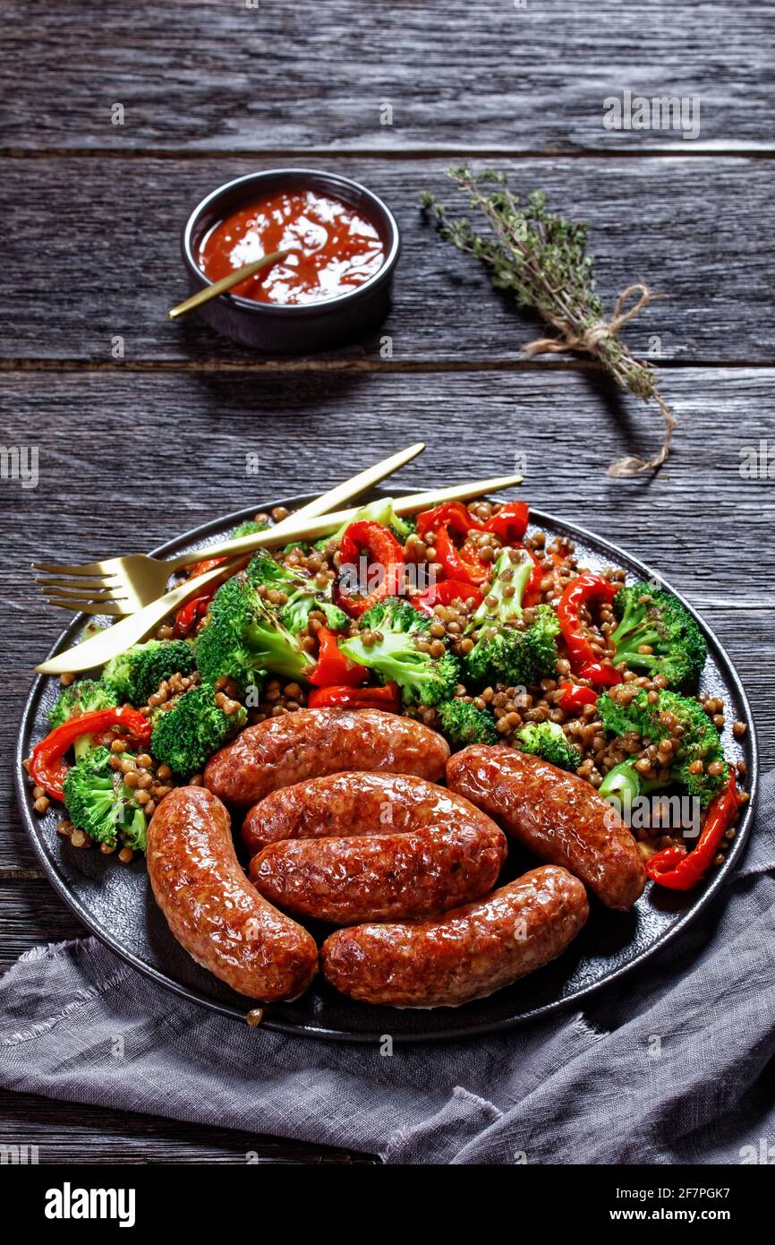 Italian cotechino pork sausages braised with brown lentils, red pepper ...