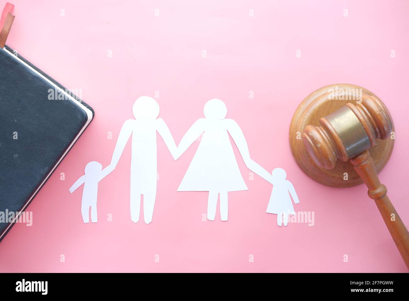 Family law, family right concept on pink background Stock Photo - Alamy