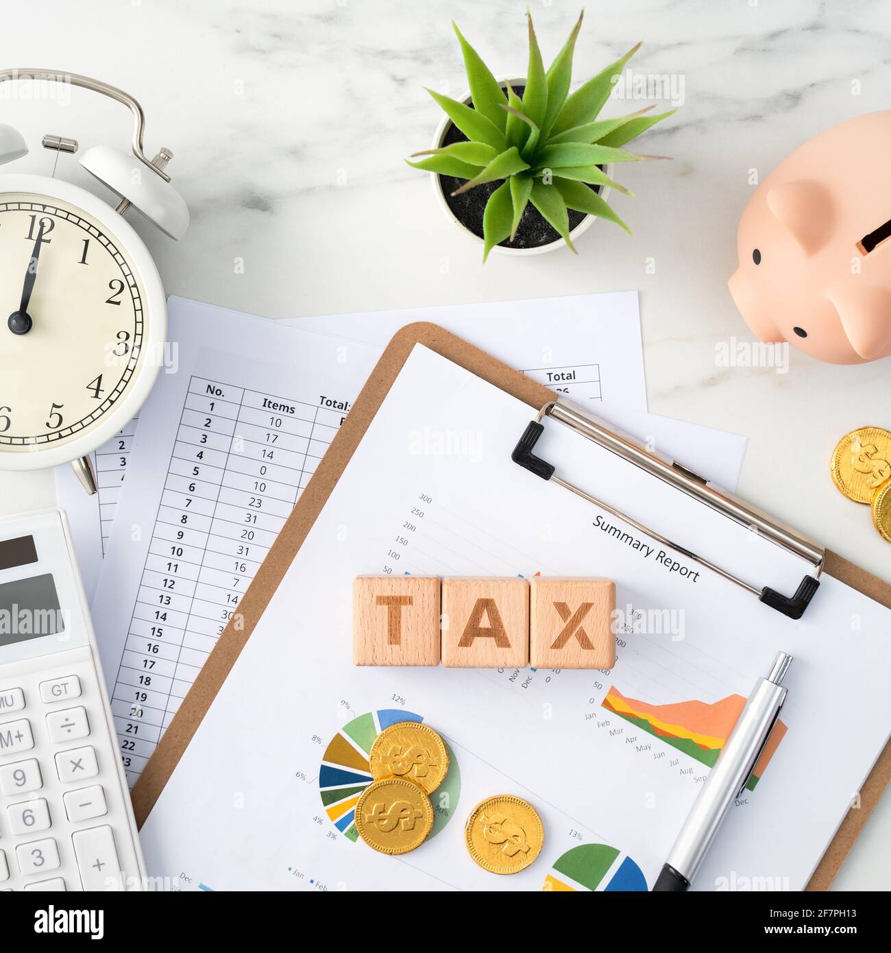 Top view of reading the overview and calculating, paying tax concept on ...