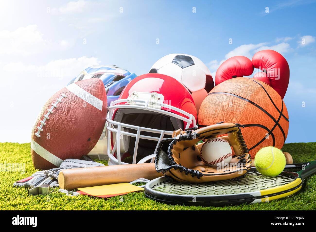 Various Sport Equipment And Balls On Grass Stock Photo - Alamy