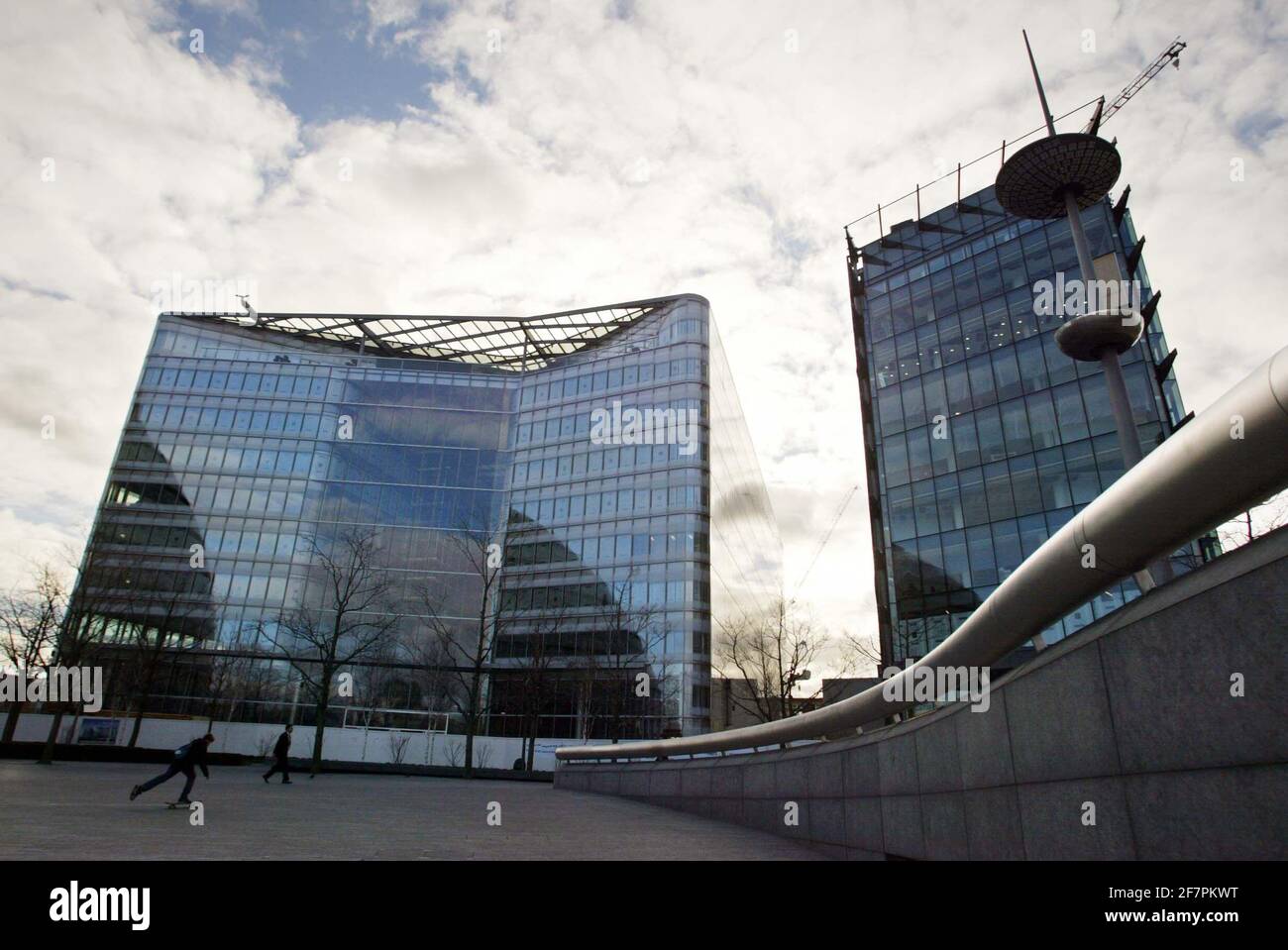 Modern glass buildings in and around the Tower Bridge area, London ...