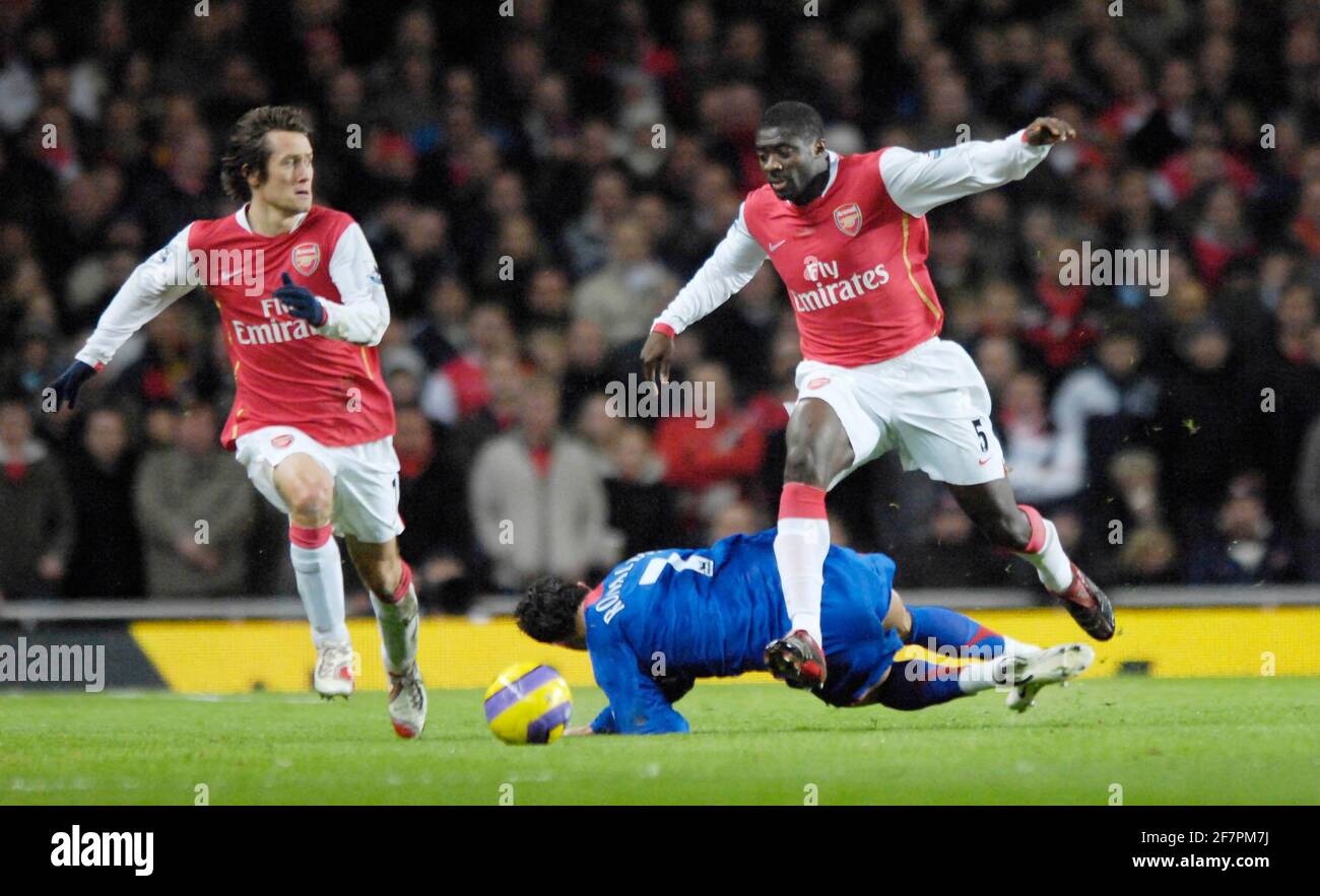 Cristiano Ronaldo goes down after he loses the ball from Kolo Toure ...