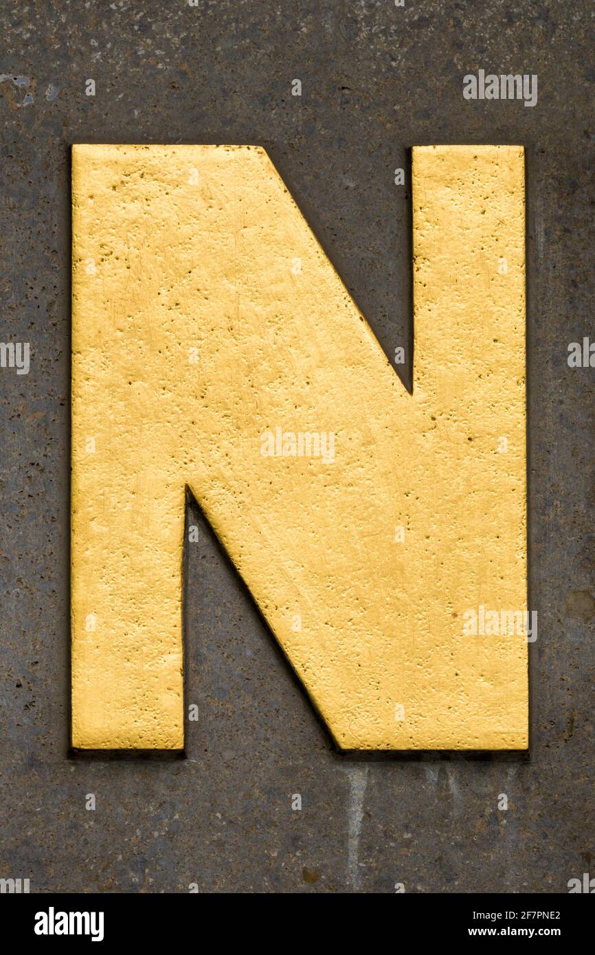 Golden letter n hi-res stock photography and images - Alamy
