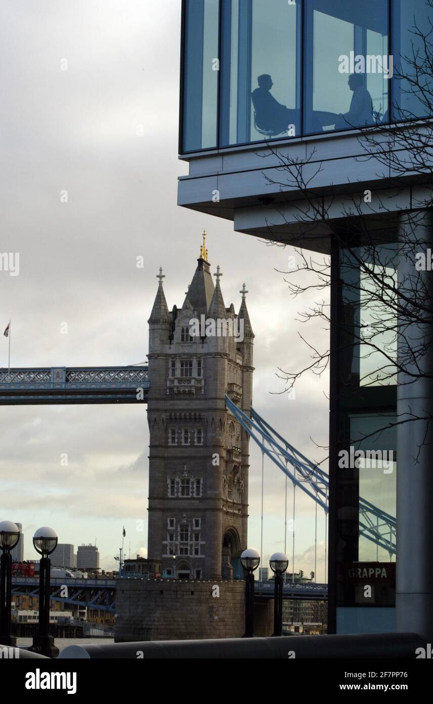 Modern glass buildings in and around the Tower Bridge area, London ...