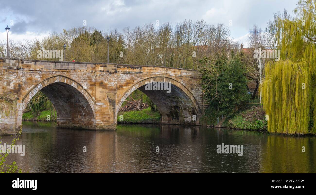 A scenic view of the River Tees at Yarm showing the road bridge and ...