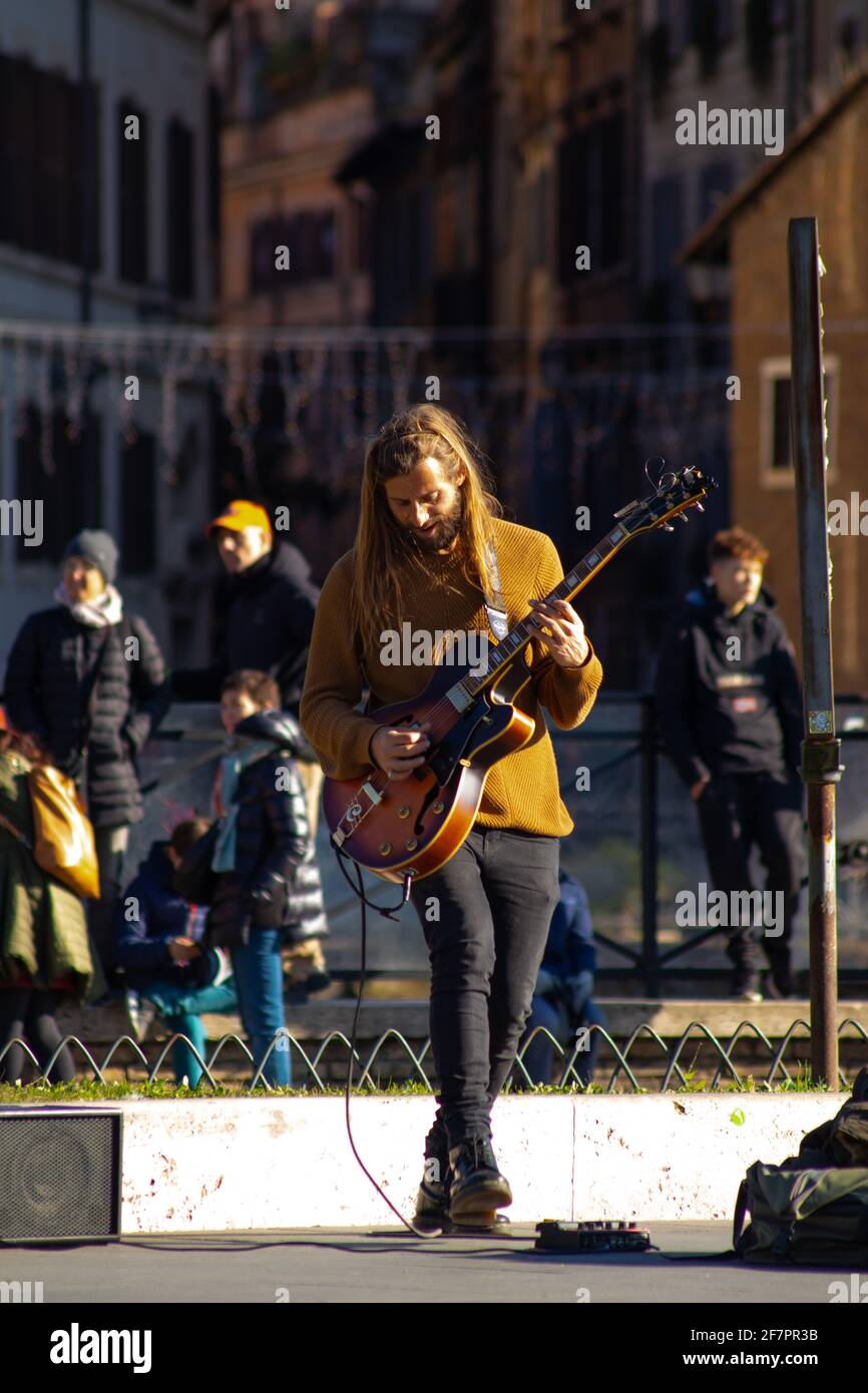 Street musician playing guitar in Rome, Italy Stock Photo - Alamy