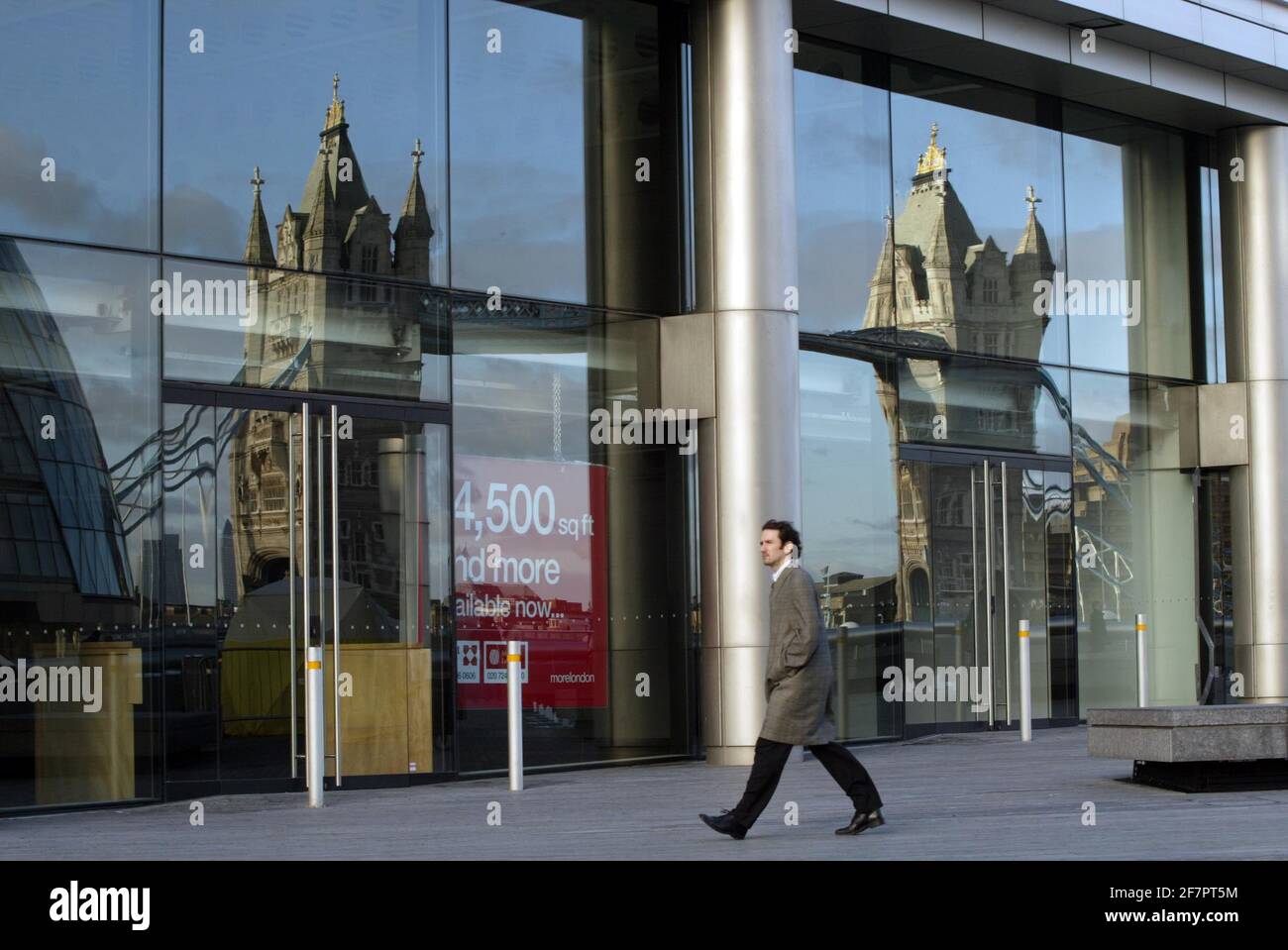 Modern glass buildings in and around the Tower Bridge area, London ...