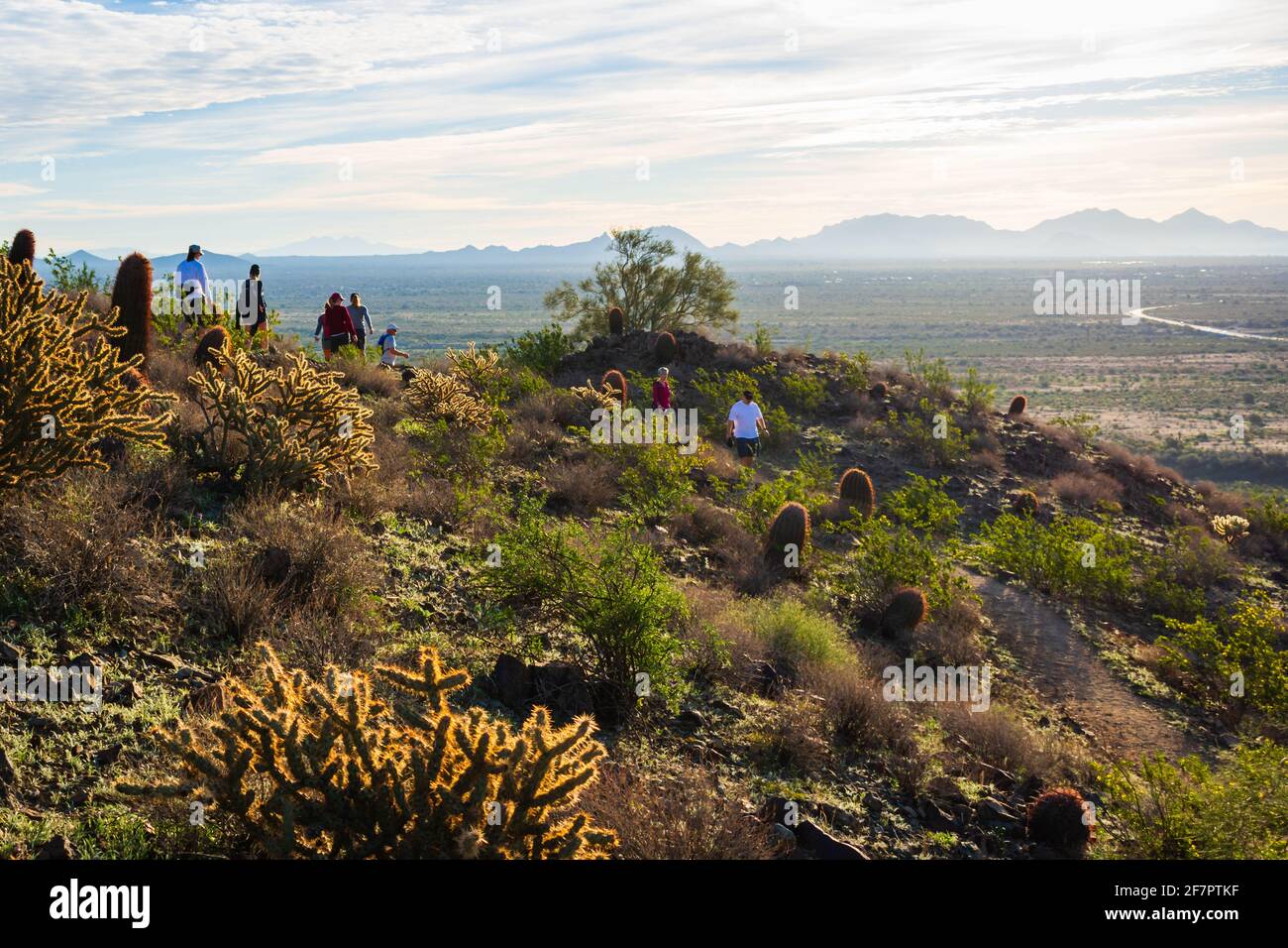 A group of women and men hiking at Apache Wash Trail, Phoenix, Arizona ...