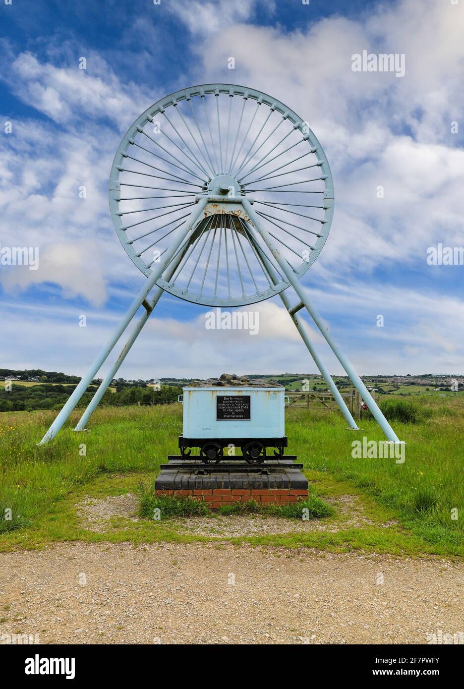 Pit wheel and coal truck commemorating coal mining at former open cast ...