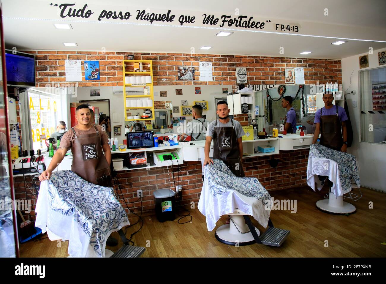 salvador, bahia, brazil - december 9, 2020: barber is seen working in a ...