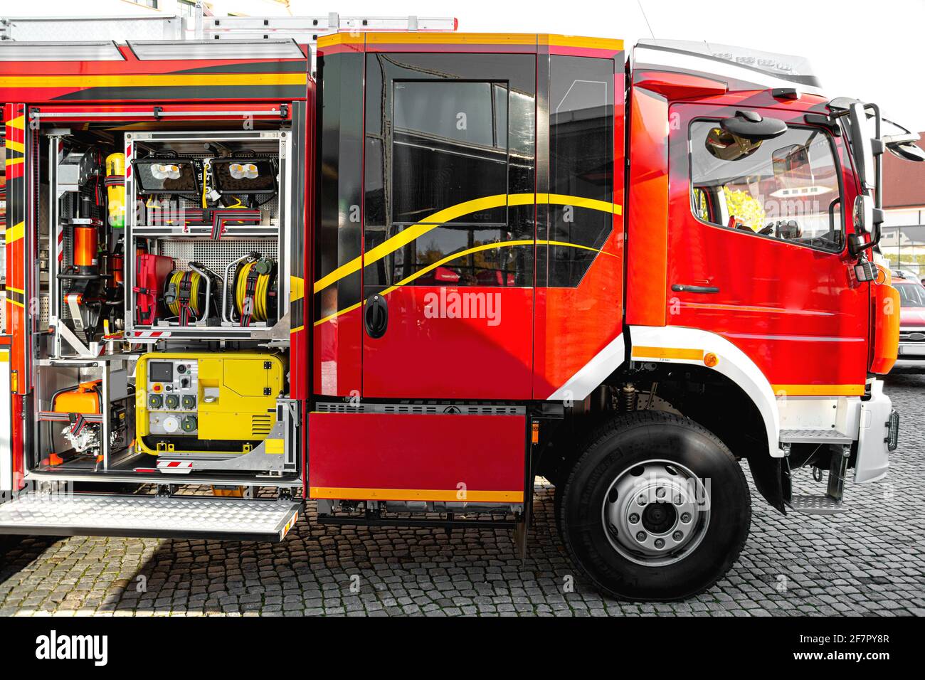Modern fire fighter truck equipped with the latest tools for rescue ...