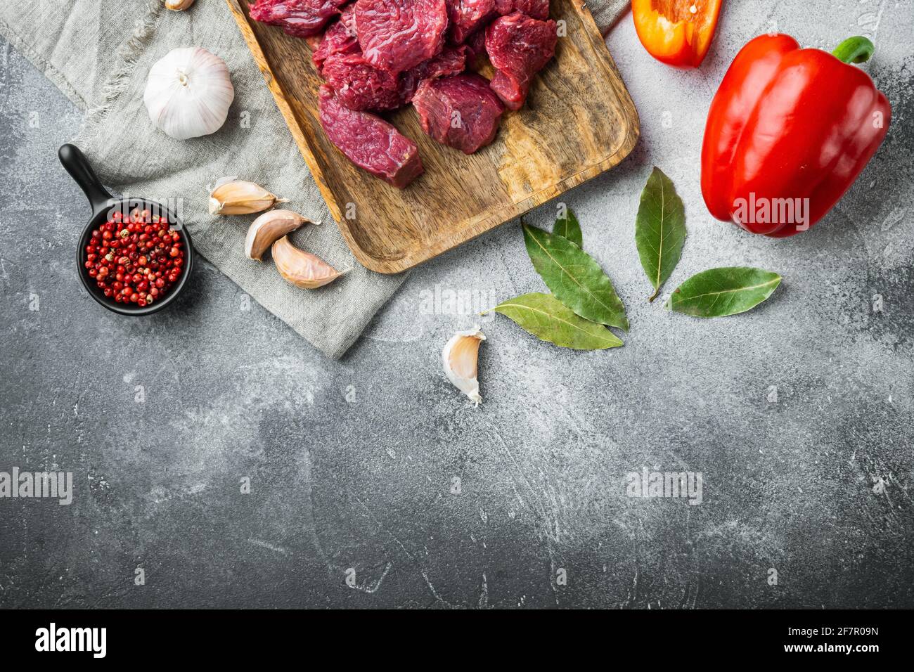Beef stew raw ingredients set, on gray stone background, top view flat ...