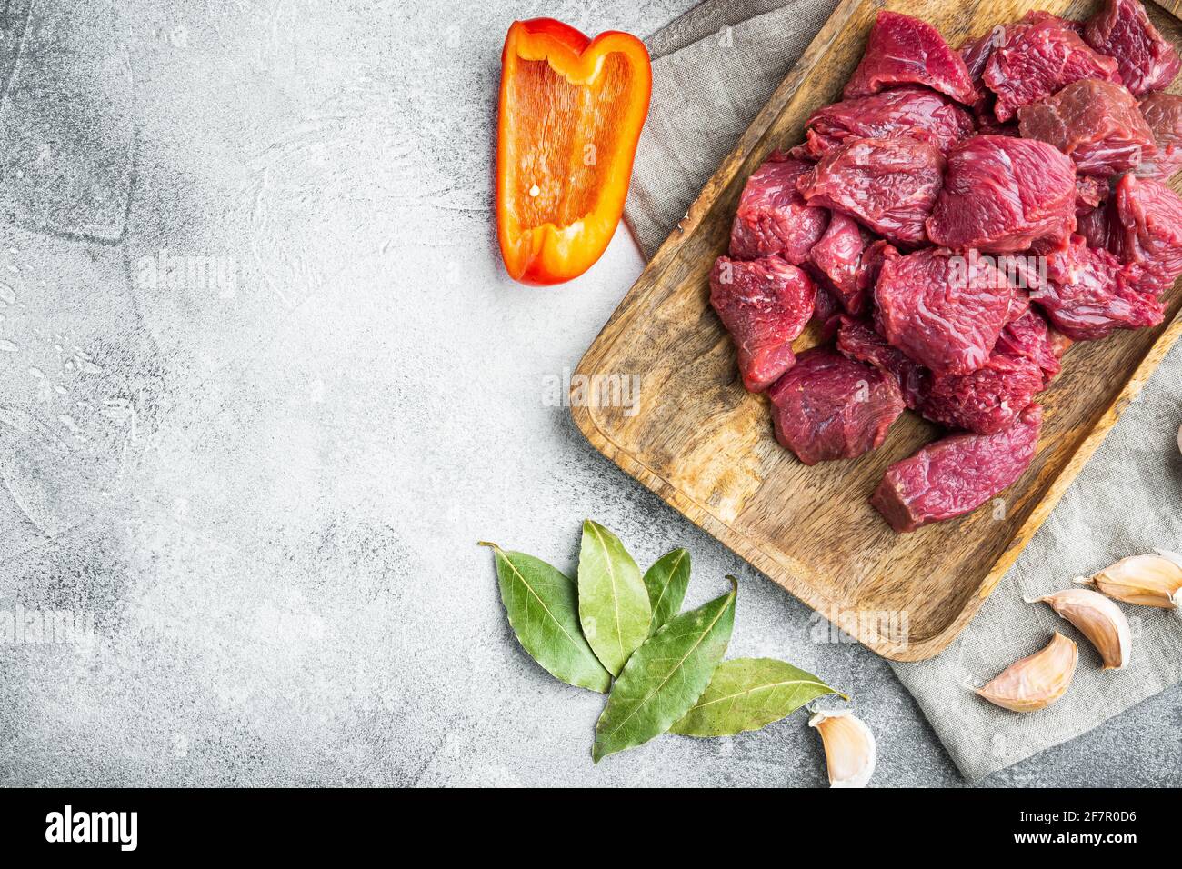 Beef stew raw ingredients set, on gray stone background, top view flat ...