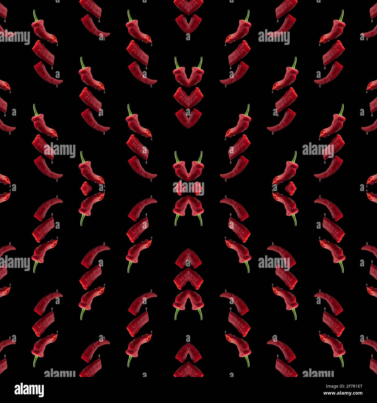 Creative seamless background with flying, red bitter pepper sliced into ...