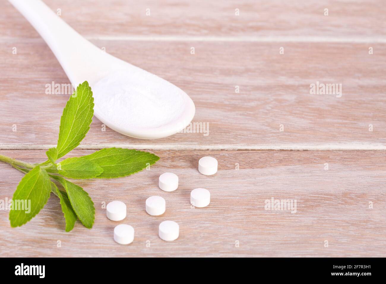 Sweetener made of Stevia in the bottom of wood - Stevia rebaudiana ...