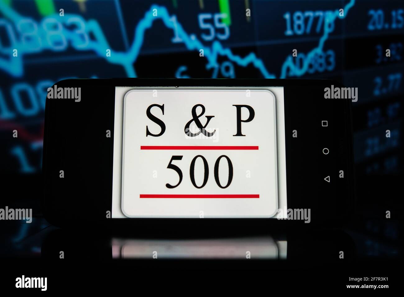 In this photo illustration a S&P 500 logo seen displayed on a ...