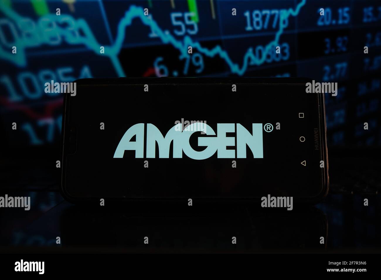 In this photo illustration an Amgen logo seen displayed on a smartphone ...