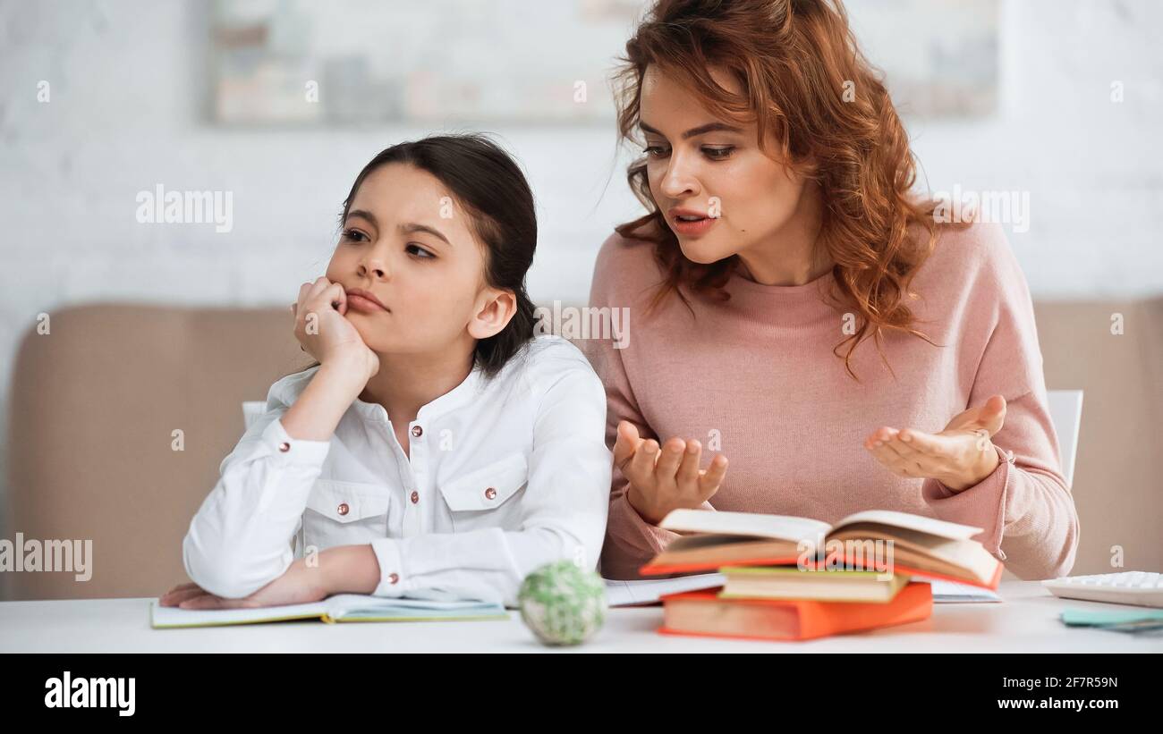 Mother talking sad girl child hi-res stock photography and images - Alamy