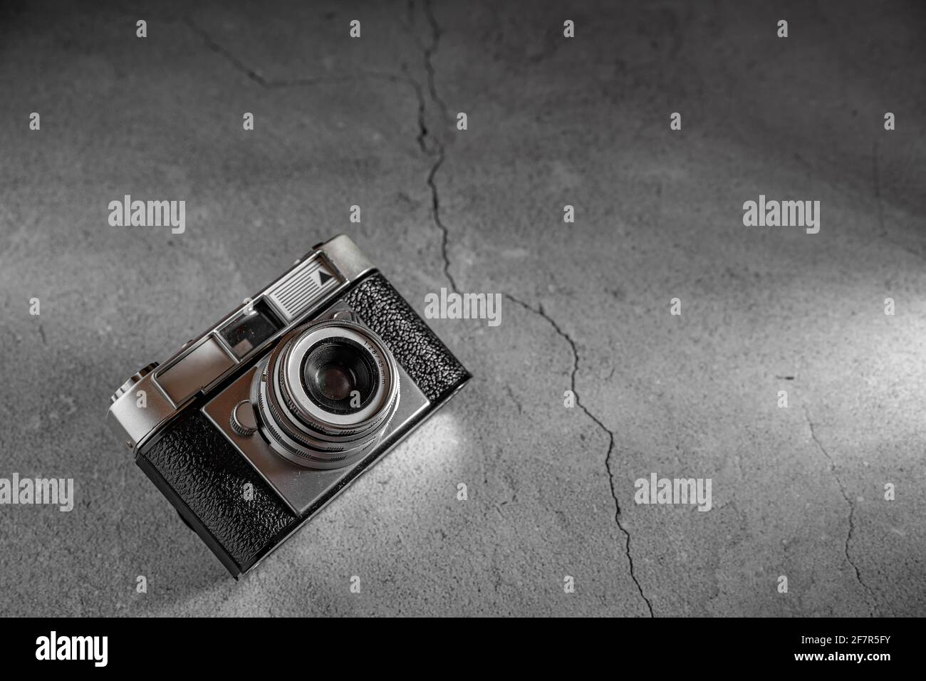 Flat lay of a old film retro camera with shallow depth of field on a ...