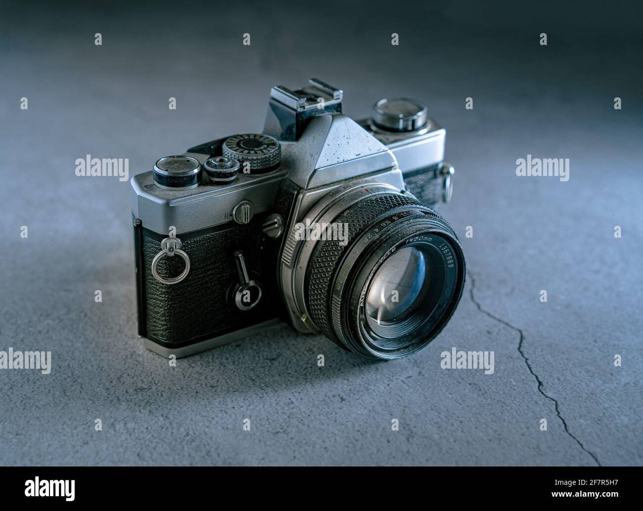 Dark product photography of a old film retro camera with shallow depth ...