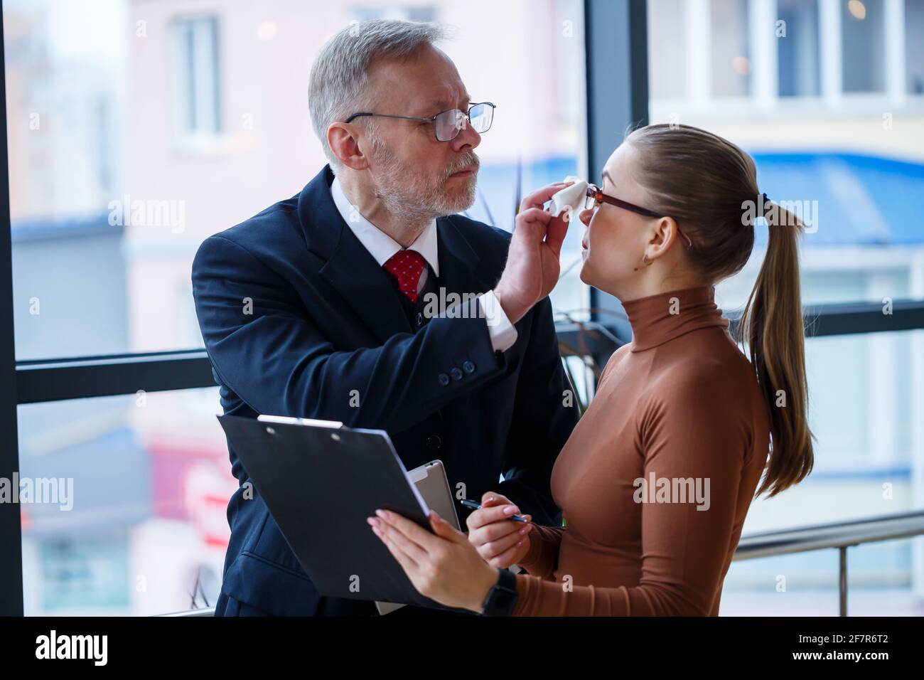 Girl manager in her own office tells a successful new business plan for ...