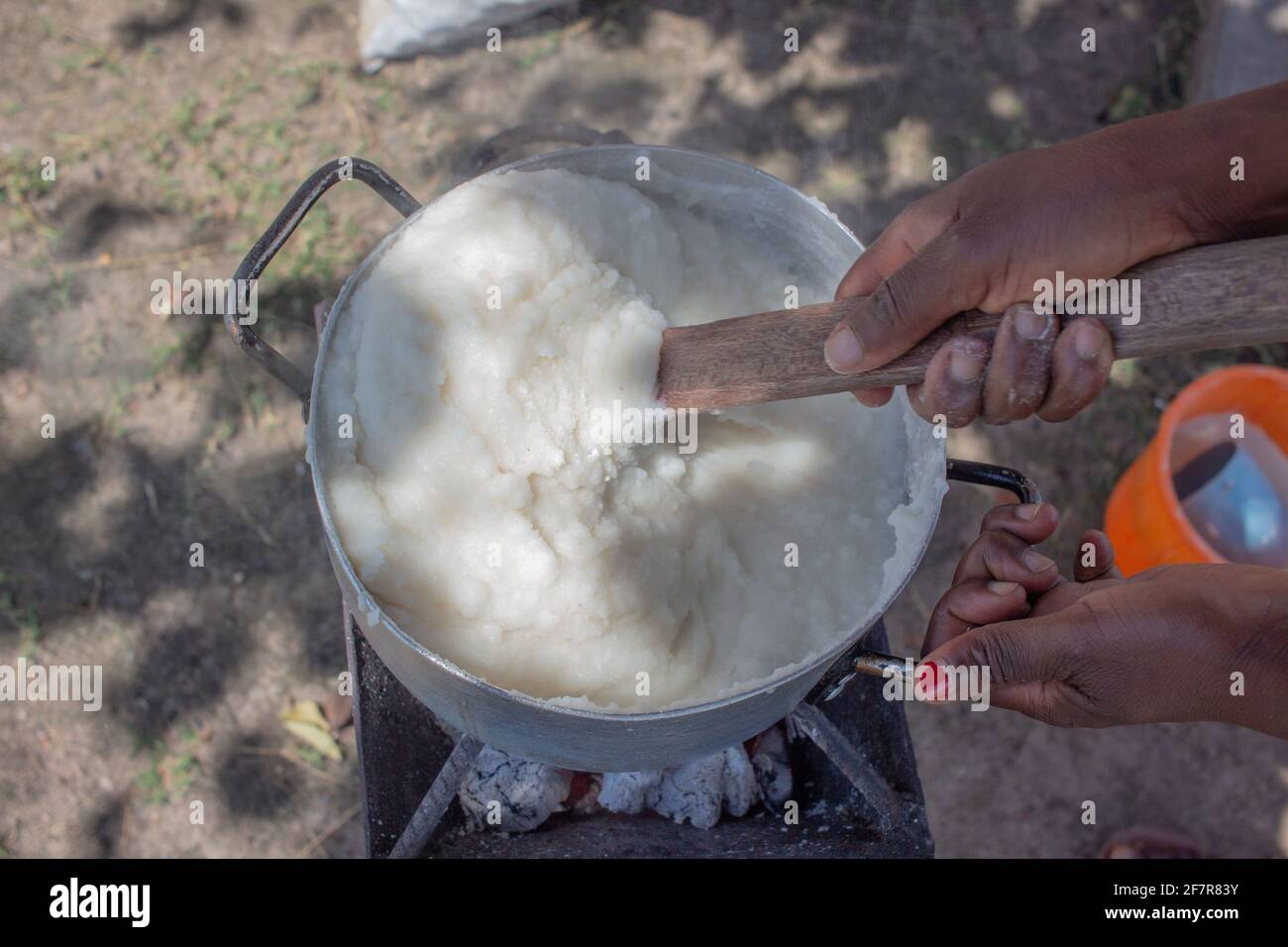 Corn or maize flour pap, a staple food in many countries in Africa ...